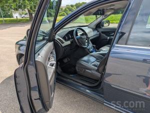Blue Volvo XC90 2013 in Jekabpils, with an engine capacity of 2.40 L and mileage of 273 thousand km for 11000 €, photo 7 on AUTOMOTO.COM.LV