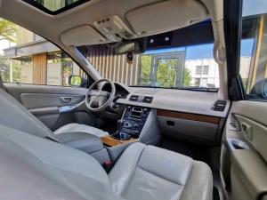 Brown Volvo XC90 2005 in Riga, with an engine capacity of 2.40 L and mileage of 314 thousand km for 5390 €, photo 13 on AUTOMOTO.COM.LV