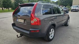 Brown Volvo XC90 2006 in Riga, with an engine capacity of 2.40 L and mileage of 280 thousand km for 4550 €, photo 6 on AUTOMOTO.COM.LV