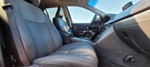 Brown Volvo XC90 2011 in Riga, with an engine capacity of 2.40 L and mileage of 217 thousand km for 11200 €, photo 22 on AUTOMOTO.COM.LV