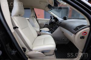 Brown Volvo XC90 2012 in Jelgava, with an engine capacity of 2.40 L and mileage of 0 thousand km for 10850 €, photo 12 on AUTOMOTO.COM.LV
