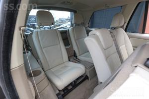 Brown Volvo XC90 2012 in Jelgava, with an engine capacity of 2.40 L and mileage of 0 thousand km for 10850 €, photo 13 on AUTOMOTO.COM.LV