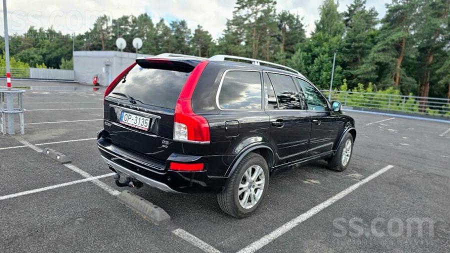 Brown Volvo XC90 2012 in Riga, with an engine capacity of 2.40 L and mileage of 322 thousand km for 12000 €, photo 13 on AUTOMOTO.COM.LV