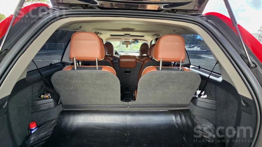 Brown Volvo XC90 2012 in Riga, with an engine capacity of 2.40 L and mileage of 322 thousand km for 12000 €, photo 19 on AUTOMOTO.COM.LV