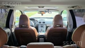 Brown Volvo XC90 2012 in Riga, with an engine capacity of 2.40 L and mileage of 323 thousand km for 11000 €, photo 12 on AUTOMOTO.COM.LV