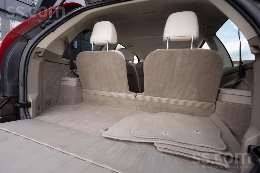 Brown Volvo XC90 2014 in Riga, with an engine capacity of 2.40 L and mileage of 285 thousand km for 12950 €, photo 29 on AUTOMOTO.COM.LV