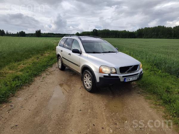Grey Volvo XC90 2003 in Ogre, with an engine capacity of 2.40 L and mileage of 406 thousand km for 1800 €, photo 1 on AUTOMOTO.COM.LV