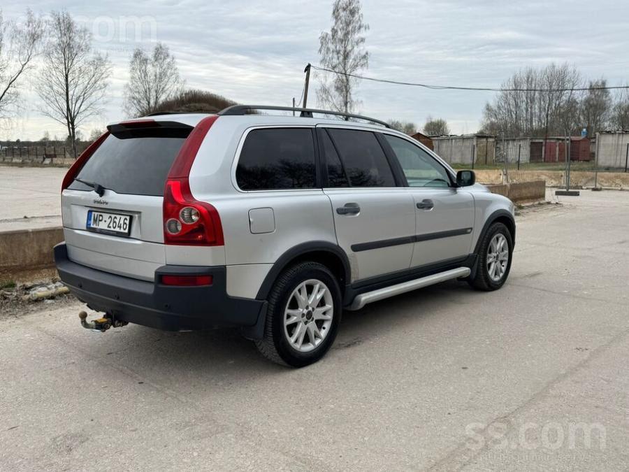 Grey Volvo XC90 2004 in Riga, with an engine capacity of 2.40 L and mileage of 0 thousand km for 3699 €, photo 6 on AUTOMOTO.COM.LV