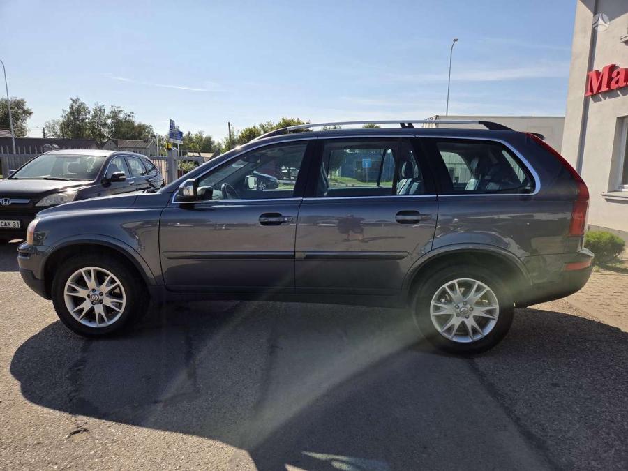 Grey Volvo XC90 2006 in Marijampole, with an engine capacity of 2.40 L and mileage of 245 thousand km for 5699 €, photo 9 on AUTOMOTO.COM.LV