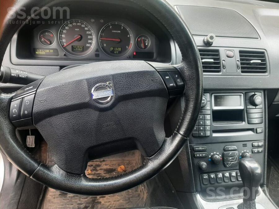 Grey Volvo XC90 2006 in Riga, with an engine capacity of 2.40 L and mileage of 424 thousand km for 2700 €, photo 12 on AUTOMOTO.COM.LV