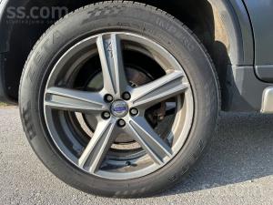 Grey Volvo XC90 2009 in Riga, with an engine capacity of 2.40 L and mileage of 303 thousand km for 5390 €, photo 11 on AUTOMOTO.COM.LV