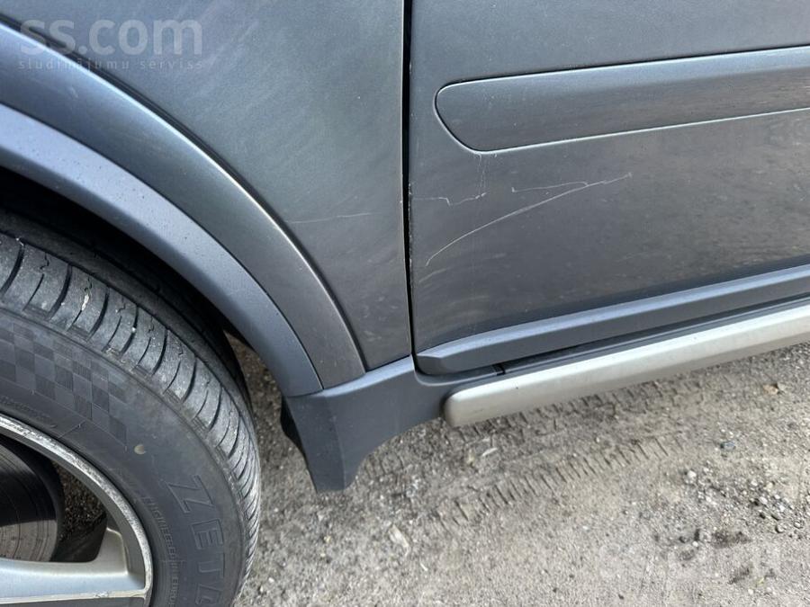 Grey Volvo XC90 2009 in Riga, with an engine capacity of 2.40 L and mileage of 303 thousand km for 5390 €, photo 12 on AUTOMOTO.COM.LV
