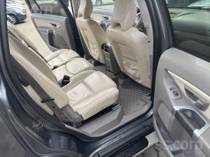 Grey Volvo XC90 2009 in Riga, with an engine capacity of 2.40 L and mileage of 235 thousand km for 8850 €, photo 13 on AUTOMOTO.COM.LV