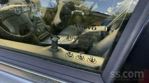 Grey Volvo XC90 2010 in Riga, with an engine capacity of 2.40 L and mileage of 308 thousand km for 8900 €, photo 27 on AUTOMOTO.COM.LV