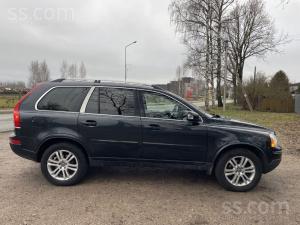 Grey Volvo XC90 2011 in Riga, with an engine capacity of 2.40 L and mileage of 250 thousand km for 9990 €, photo 6 on AUTOMOTO.COM.LV