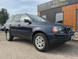 Pelēks Volvo XC90 2011 Rīga, ar dzinēja tilpumu 2.40 L un nobraukumu 274 tūkst. km par 9700 €, foto  vietnē AUTOMOTO.COM.LV