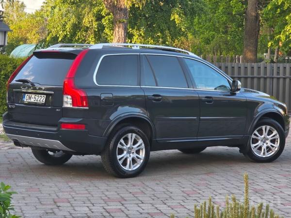 Grey Volvo XC90 2012 in Riga, with an engine capacity of 2.40 L and mileage of 303 thousand km for 11950 €, photo 5 on AUTOMOTO.COM.LV