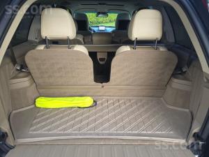 Grey Volvo XC90 2012 in Riga, with an engine capacity of 2.40 L and mileage of 303 thousand km for 11950 €, photo 15 on AUTOMOTO.COM.LV