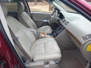 Red Volvo XC90 2004 in Riga, with an engine capacity of 2.50 L and mileage of 300 thousand km for 1490 €, photo 17 on AUTOMOTO.COM.LV