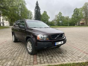 Red Volvo XC90 2006 in Aluksne, with an engine capacity of 2.40 L and mileage of 410 thousand km for 7500 €, photo 1 on AUTOMOTO.COM.LV