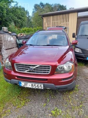 Sarkans Volvo XC90 2007 Ogre, ar dzinēja tilpumu 2.40 L un nobraukumu 410 tūkst. km par 5000 €, foto  vietnē AUTOMOTO.COM.LV