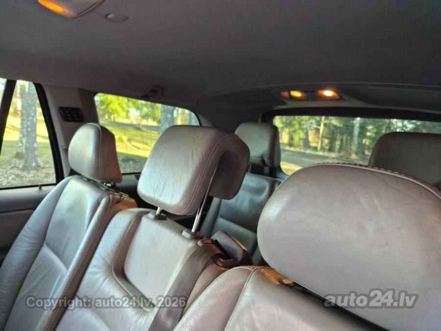 Sarkans Volvo XC90 2008 Tartu, ar dzinēja tilpumu 2.40 L un nobraukumu 389 tūkst. km par 3800 €, foto 10 vietnē AUTOMOTO.COM.LV