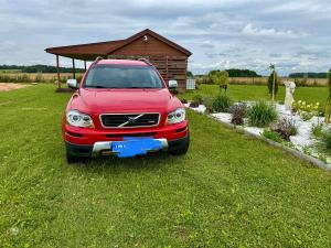 Red Volvo XC90 2008 in Jonava, with an engine capacity of 2.40 L and mileage of 347 thousand km for 6000 €, photo 5 on AUTOMOTO.COM.LV
