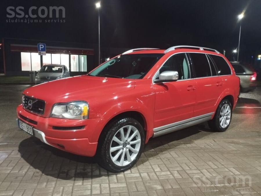 Red Volvo XC90 2012 in Riga, with an engine capacity of 2.40 L and mileage of 0 thousand km for 9990 €, photo 1 on AUTOMOTO.COM.LV