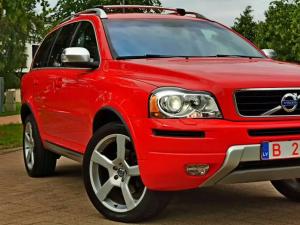 Red Volvo XC90 2012 in Riga, with an engine capacity of 2.40 L and mileage of 165 thousand km for 15500 €, photo 3 on AUTOMOTO.COM.LV