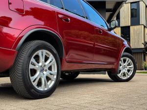 Red Volvo XC90 2013 in Riga, with an engine capacity of 2.40 L and mileage of 215 thousand km for 8600 €, photo 5 on AUTOMOTO.COM.LV