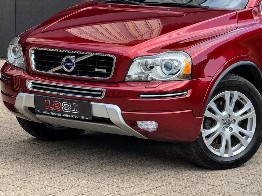 Red Volvo XC90 2013 in Riga, with an engine capacity of 2.40 L and mileage of 215 thousand km for 8600 €, photo 6 on AUTOMOTO.COM.LV