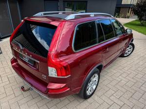 Red Volvo XC90 2013 in Riga, with an engine capacity of 2.40 L and mileage of 215 thousand km for 8600 €, photo 7 on AUTOMOTO.COM.LV