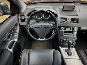 Red Volvo XC90 2013 in Riga, with an engine capacity of 2.40 L and mileage of 215 thousand km for 8600 €, photo 12 on AUTOMOTO.COM.LV