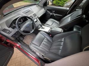 Red Volvo XC90 2013 in Riga, with an engine capacity of 2.40 L and mileage of 215 thousand km for 8600 €, photo 15 on AUTOMOTO.COM.LV