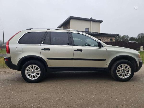 Yellow Volvo XC90 2006 in Kaunas, with an engine capacity of 2.40 L and mileage of 283 thousand km for 4450 €, photo 6 on AUTOMOTO.COM.LV
