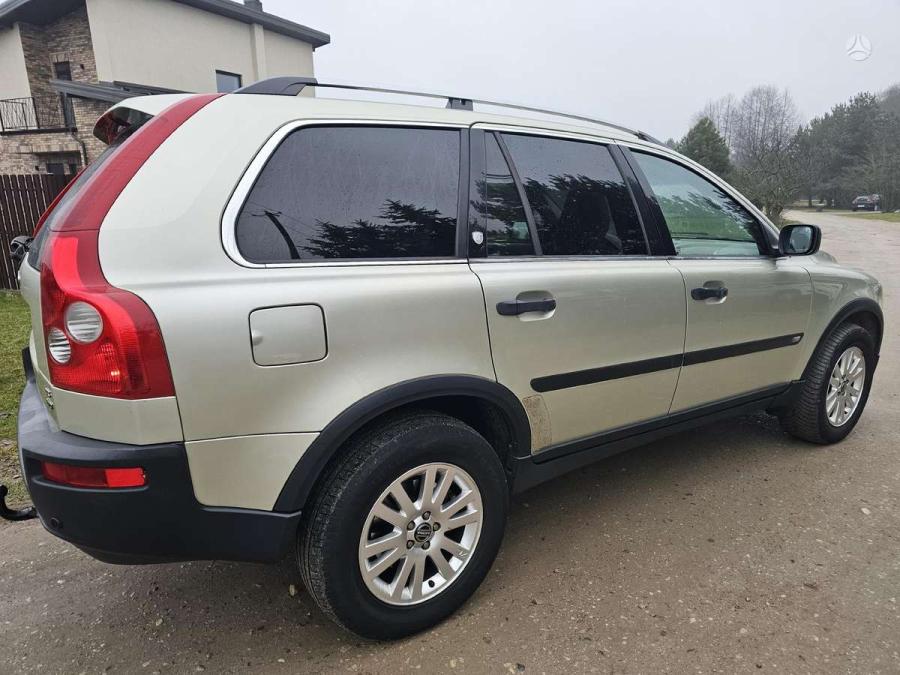 Yellow Volvo XC90 2006 in Kaunas, with an engine capacity of 2.40 L and mileage of 283 thousand km for 4450 €, photo 7 on AUTOMOTO.COM.LV