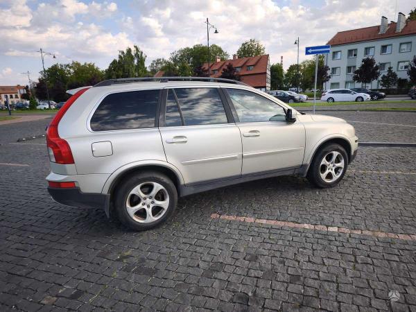 Volvo XC90 2007 in Klaipeda on AUTOMOTO.COM.LV Yellow Volvo XC90 2007 in Klaipeda, with an engine capacity of 3.19 L and mileage of 464 thousand km for 2000 €, photo 6 on AUTOMOTO.COM.LV
