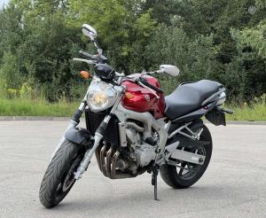Sarkans Yamaha FZ 6N 2006 Viļņa, ar dzinēja tilpumu 0.60 L un nobraukumu 29 tūkst. km par 2499 €, foto  vietnē AUTOMOTO.COM.LV