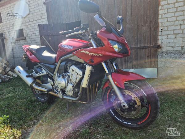 Red Yamaha FZS 2002 in Taurage, with an engine capacity of 1.00 L and mileage of 55 thousand km for 1400 €, photo 5 on AUTOMOTO.COM.LV