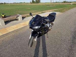 Black Yamaha R6 1999 in Kaunas, with an engine capacity of 0.60 L and mileage of 49 thousand km for 1700 €, photo  on AUTOMOTO.COM.LV
