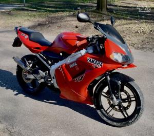 Sarkans Yamaha TZR 2003 Kauņa, ar dzinēja tilpumu 0.05 L un nobraukumu 30 tūkst. km par 1200 €, foto  vietnē AUTOMOTO.COM.LV