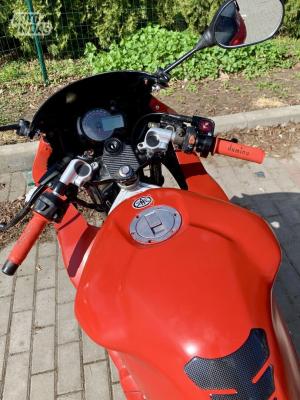 Sarkans Yamaha TZR 2003 Kauņa, ar dzinēja tilpumu 0.05 L un nobraukumu 30 tūkst. km par 1200 €, foto 6 vietnē AUTOMOTO.COM.LV