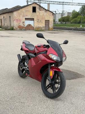 Красный Ямаха TZR 2007 в Шяуляй, объемом двигателя 0.05 л и пробегом 24 тыс. км за 1450 €, фото  на AUTOMOTO.COM.LV