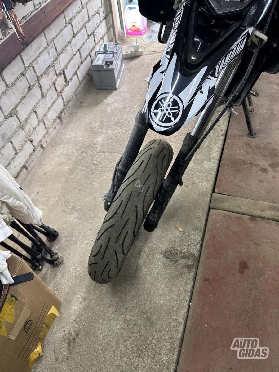 Melns Yamaha WR 125X 2010 Viļņa, ar dzinēja tilpumu 0.13 L un nobraukumu 36 tūkst. km par 2100 €, foto 13 vietnē AUTOMOTO.COM.LV