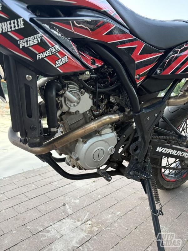Black Yamaha WR 125X 2010 in Plunge, with an engine capacity of 0.13 L and mileage of 30 thousand km for 2400 €, photo 9 on AUTOMOTO.COM.LV