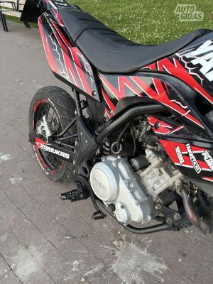 Black Yamaha WR 125X 2010 in Plunge, with an engine capacity of 0.13 L and mileage of 30 thousand km for 2400 €, photo 12 on AUTOMOTO.COM.LV