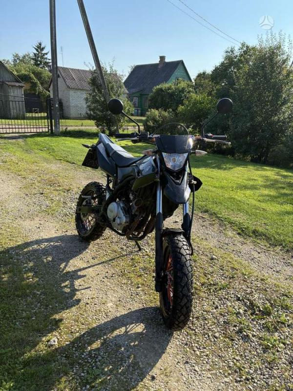 Black Yamaha WR 125X 2010 in Mazeikiai, with an engine capacity of 0.13 L and mileage of 27 thousand km for 1800 €, photo 3 on AUTOMOTO.COM.LV