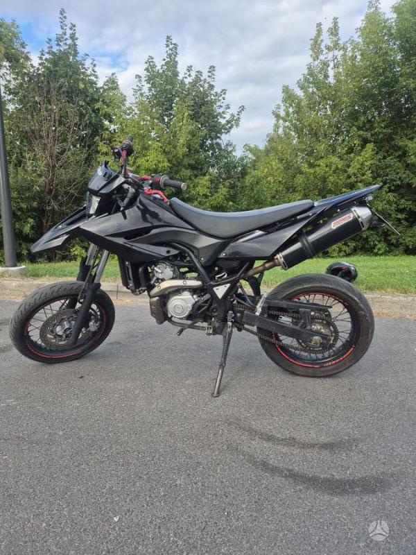 Black Yamaha WR 125X 2010 in Kaunas, with an engine capacity of 0.13 L and mileage of 30 thousand km for 1950 €, photo 1 on AUTOMOTO.COM.LV