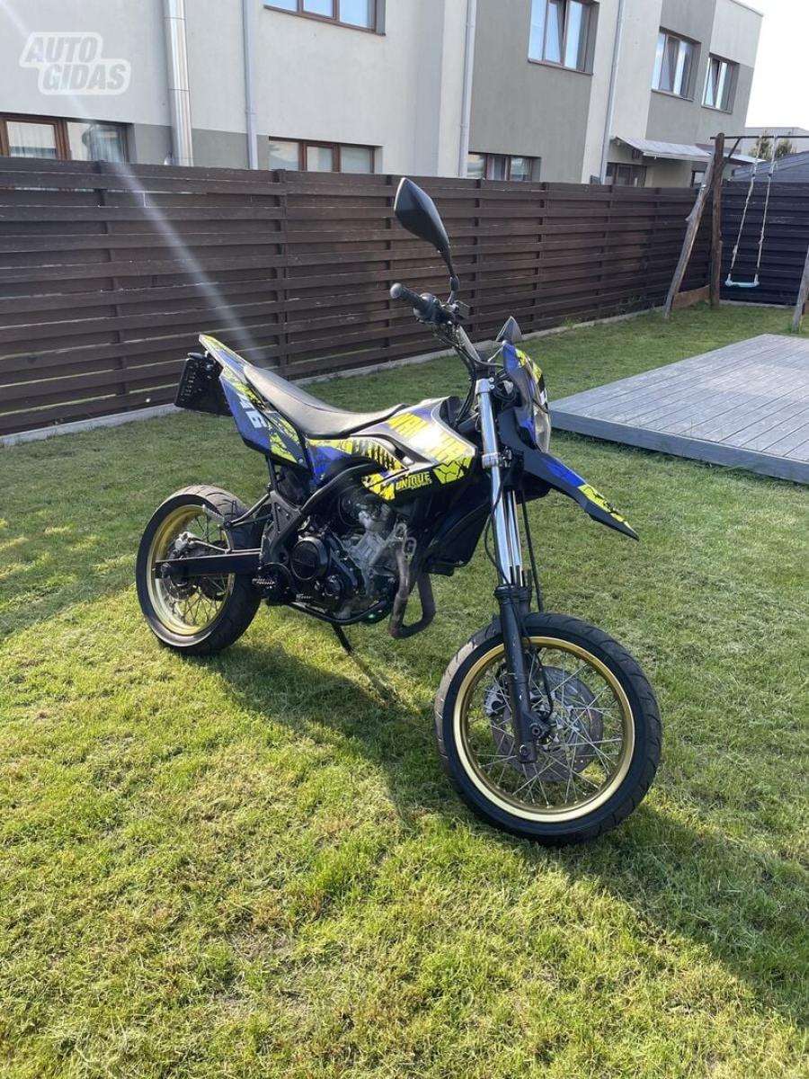 Black Yamaha WR 125X 2011 in Kaunas, with an engine capacity of 0.13 L and mileage of 58 thousand km for 1900 €, photo 1 on AUTOMOTO.COM.LV