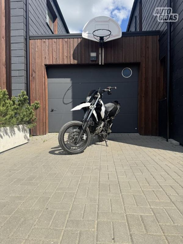 Melns Yamaha WR 125X 2012 Kauņa, ar dzinēja tilpumu 0.13 L un nobraukumu 23 tūkst. km par 2200 €, foto 1 vietnē AUTOMOTO.COM.LV